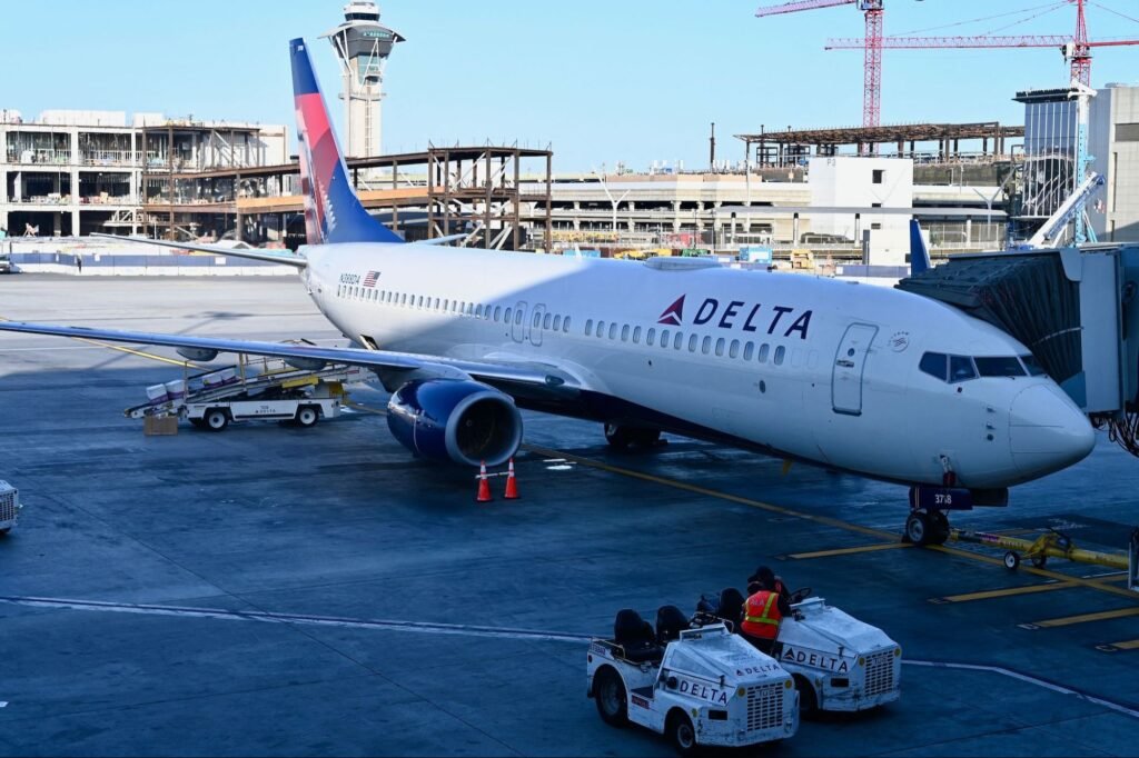 A Passenger On A Delta Flight Was Arrested For Using Plane's Emergency ...